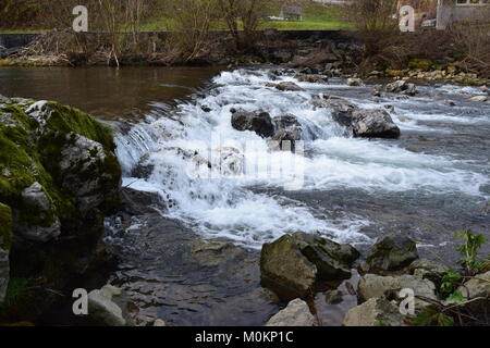rocks and small river in the village Stock Photo - Alamy