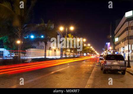 Palestine street in Jeddah at night, with car lights motion, Saudi ...