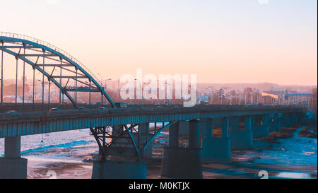 panorama of transport on the bridge and sunrise over the Belaya River ...