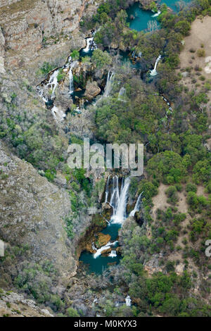 A waterfall in the Krka National Park on a cold autumn day in Croatia ...