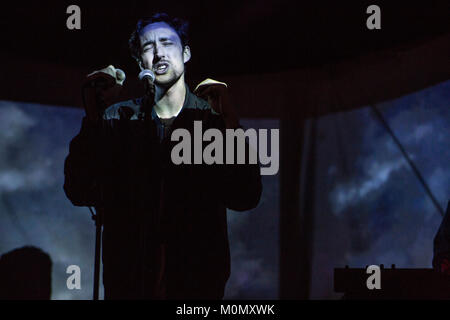 American singer and artist Tom Krell pictured live on stage and ...