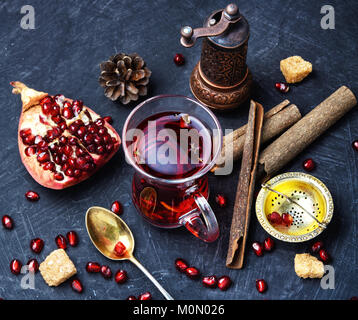 Cup with turkish tasty tea with pomegranate Stock Photo - Alamy
