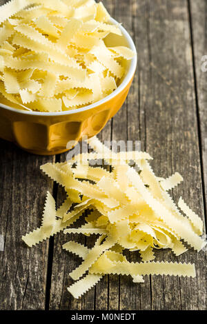 italian spaghetti on wooden background Stock Photo - Alamy