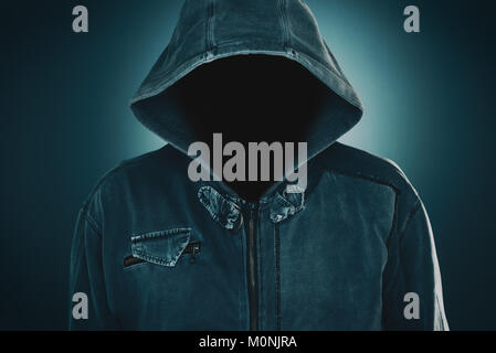Mysterious suspicious faceless man with hoodie, dark low key portrait ...