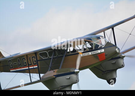 De Haviland Dragon Rapide 1930s passenger airplane G-AGJG in camouflage ...