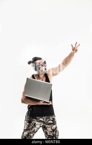 emotional and charismatic DJ - rapper in headphones takes the ra Stock ...