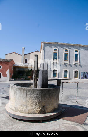An old stone crusher for olives Stock Photo - Alamy