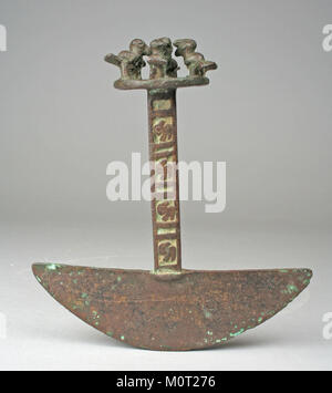 A ceremonial Tumi knife from ancient Peru, featuring a curved blade and ...