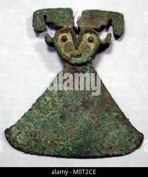 A ceremonial Tumi knife from ancient Peru, featuring a curved blade and ...