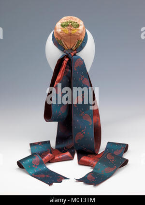 A historical cap from the MET collection, showcasing a detailed design ...