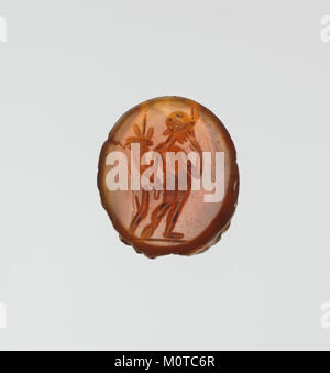 A carnelian scarab featuring Harpocrates with a cornucopia, cataloged ...