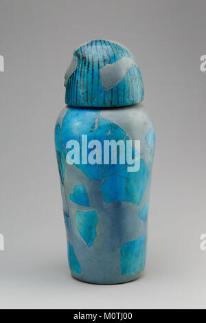 An ancient Egyptian canopic jar lid, featuring a detailed lid design ...