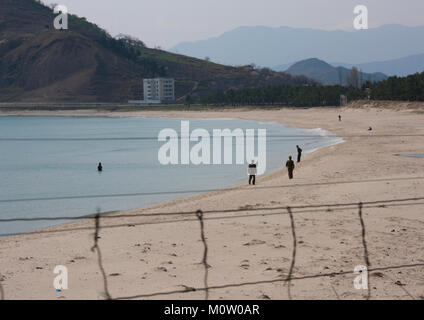 North Korean soldiers walking on a beach in the east sea, Kangwon ...