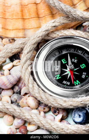 seashell and compass on old paper isolated at white background Stock ...