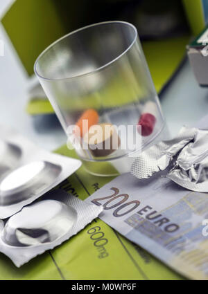 Container pills next to a ticket dollars, conceptual image Stock Photo ...