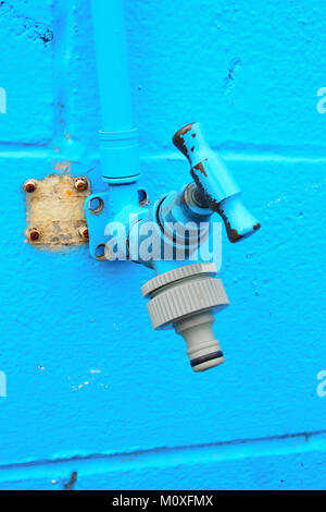 Closeup of pvc pipes with tap or faucet Stock Photo - Alamy