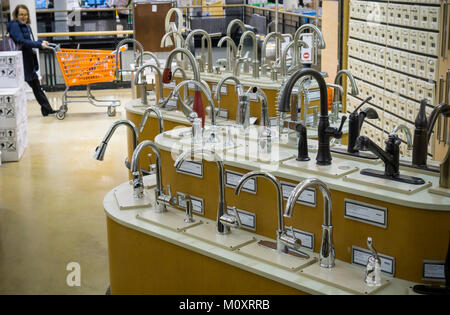 Plumbing fixtures on display in a Home Depot store in the Chelsea Stock ...