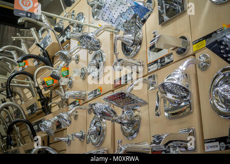Plumbing fixtures on display in a Home Depot store in the Chelsea Stock ...