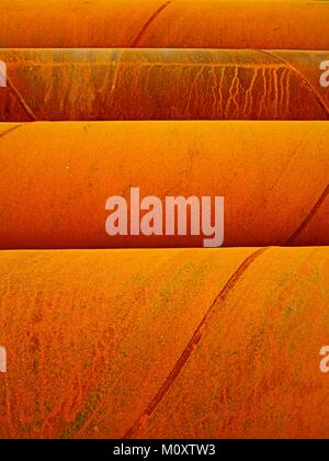Gold pipe as metal background close-up photo Stock Photo - Alamy