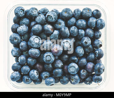 Bog blueberries isolated on white background one whole one half Stock ...