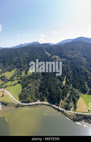 Germany, Bavaria, Halblech, Aerial view of small chapel, farmhouse and ...