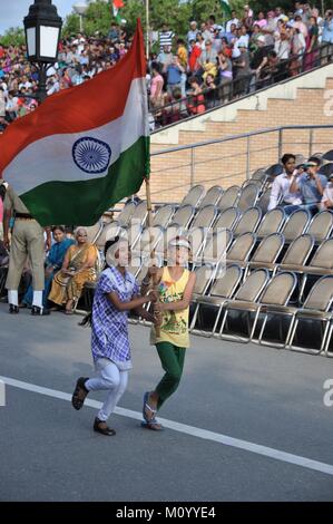 Raising the Flag at the Wagah Border Flag Ceremony Stock Photo - Alamy