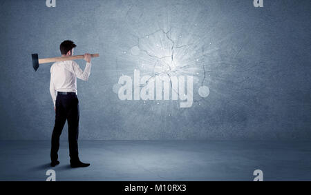 Business man hitting wall with a hammer Stock Photo - Alamy
