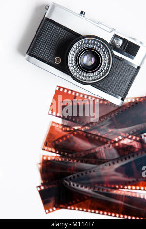 Vintage analog film camera and film negatives Stock Photo - Alamy