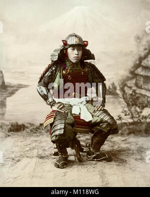 Samurai in Armour, 1870s-1890s. Man wearing traditional armour blowing ...