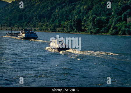 European river cruise and commercial barges Stock Photo - Alamy