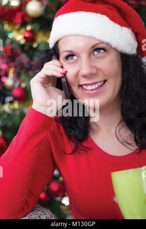 beautiful young christmas woman making a funny expression Stock Photo ...