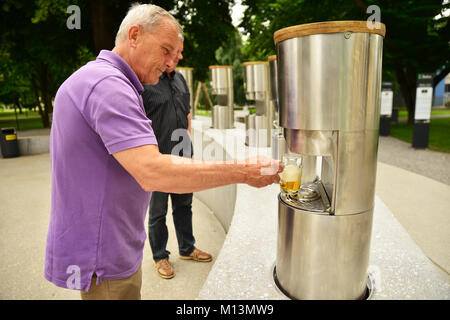 Žalec, Slovenia on JUNE 5., 2017. First beer fountain - The Green Gold ...