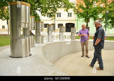 Žalec, Slovenia on JUNE 5., 2017. First beer fountain - The Green Gold ...