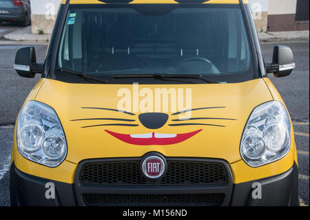 Bright yellow colour Fiat 500 Cinquecento- typical Italian small city ...