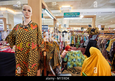 Clothing, fashion in Java, Javanese costumes, from the left, a ...