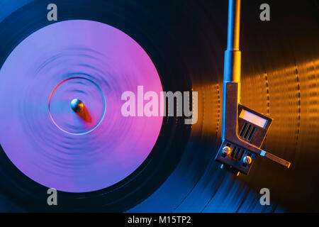 Cinemagraph, retro record vinyl player. Record on turntable. Top view ...