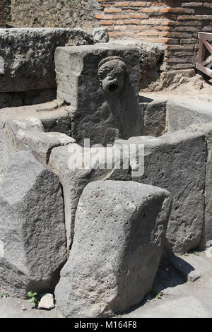 An ancient Roman water trough in the town of Herculaneum Stock Photo ...