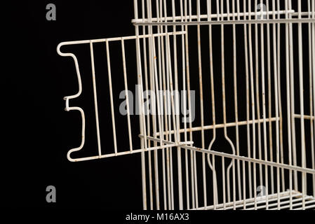 Cage with an open door, a conceptual shot on freedom Stock Photo - Alamy