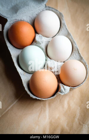 Different sizes brown cardboard box stacked in parcel delivery shop ...