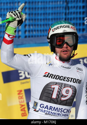 Vincent Kriechmayr of Austria reacts in the finish area following his ...