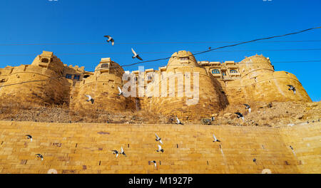 Jaisalmer Fort yellow limestone architecture. Jaisalmer Fort also known as the Golden Fort is a ...