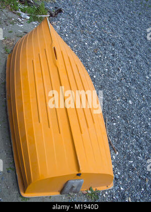 Upside Down Dinghy On A Beach Stock Photo - Alamy