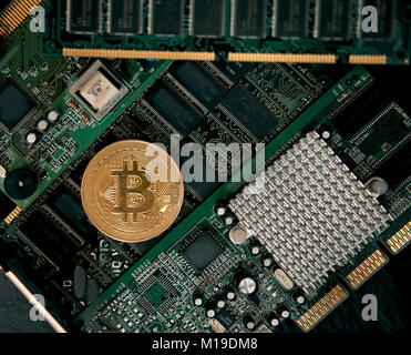 bitcoin among computer chips Stock Photo - Alamy