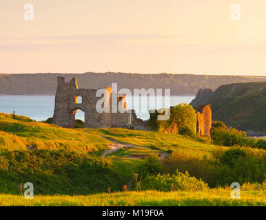 Pennard Castle ruins overlooking Three Cliffs Bay The Gower Peninsula ...