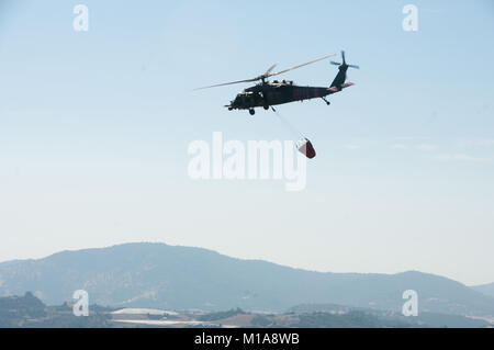 Photos show helibase, 129th Rescue Wing, cloud coverage, fires, and ...