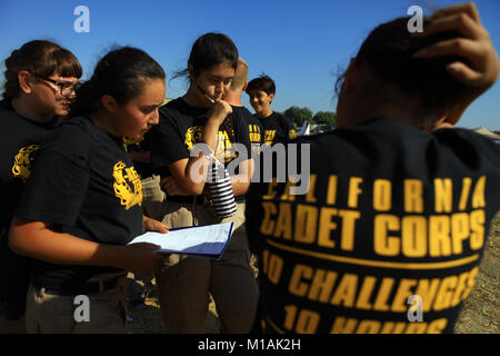 California Cadet Corps Cadet 1st Class Jonathon McReynolds, left, a ...