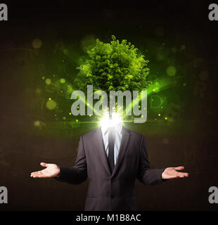Man with green tree head concept Stock Photo - Alamy