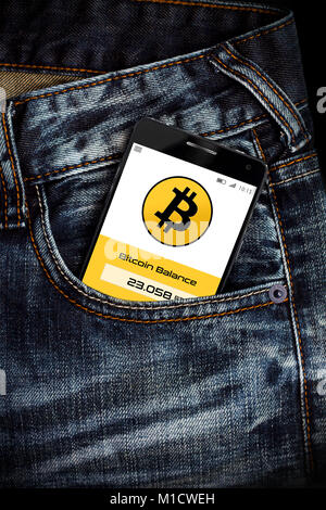Bitcoin digital wallet in smartphone and gold bit coins, crypto ...