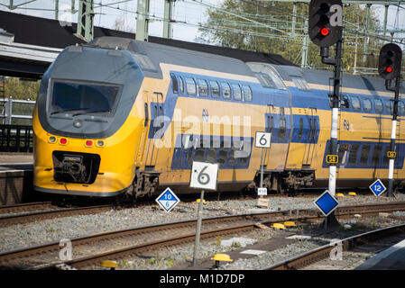 A NS VIRM double-deck train arrives at Haarlem main railway station in ...