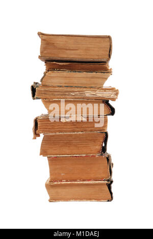 Stacked old books of different shape and color. Isolated on white ...